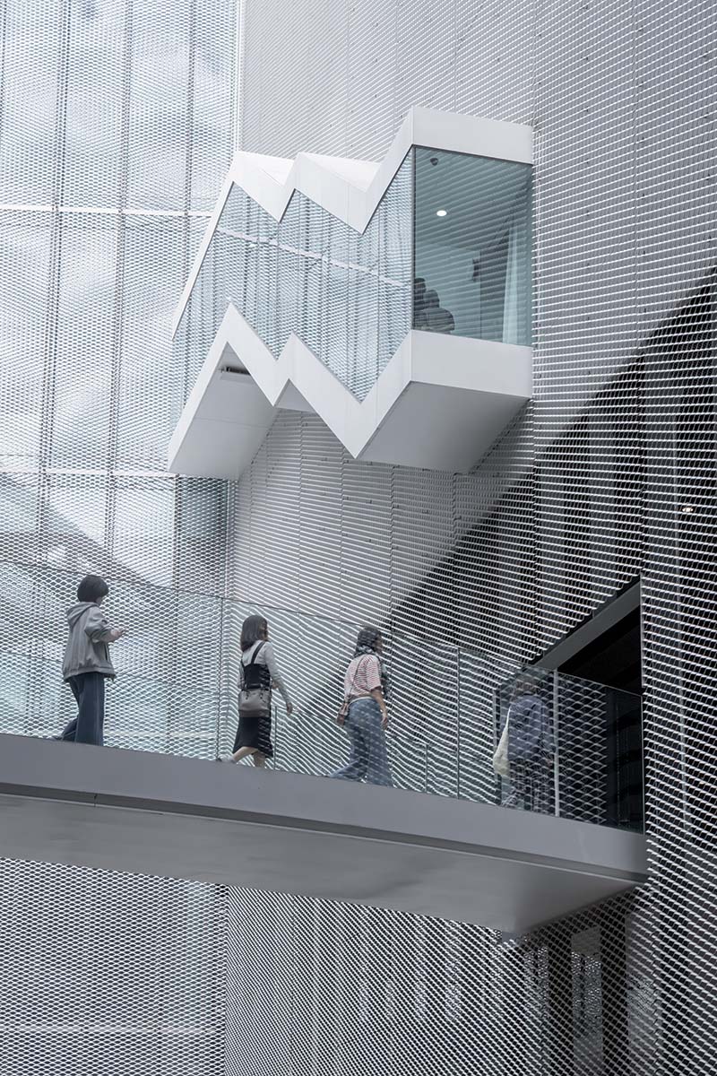 SANAA Creates a Cluster of Volumes Housing a Museum and Library to ...